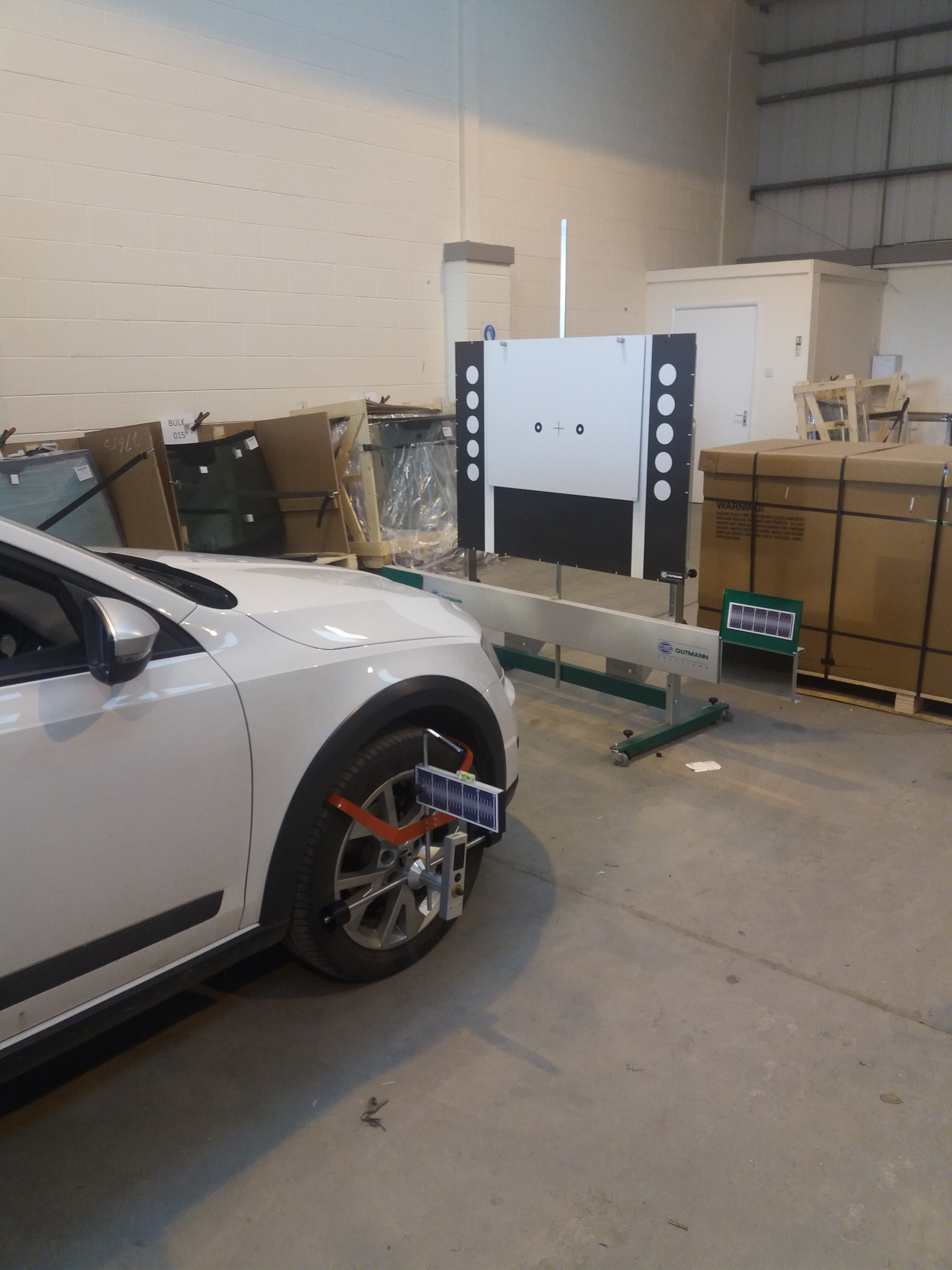 Cracked windscreen fair enough, camera realignment erm ok, 4 wheel ...